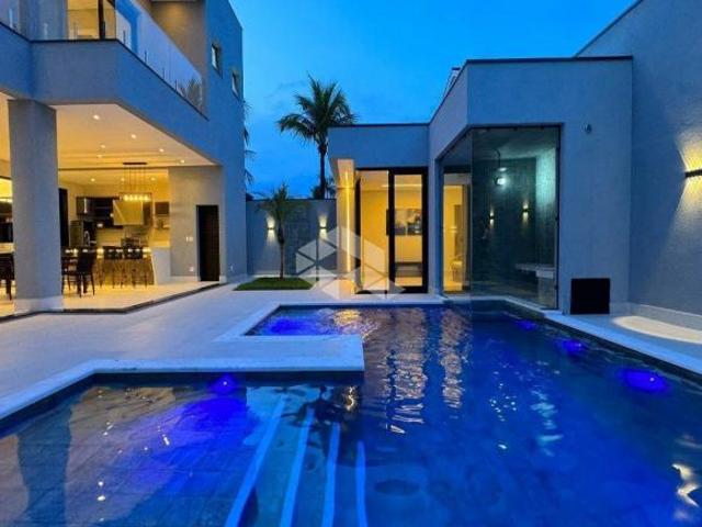 Casa de luxo a venda no Guarujá SP Casa ao lado da praia 5 suítes 490,00m²