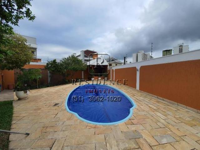 Casa de Luxo à Venda ou Locação em Canoas RS, Bairro Moinhos de Vento: 5 Quartos, 2 Suítes, 3 Salas