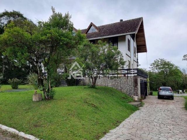 Casa de luxo em condomínio de auto padrão