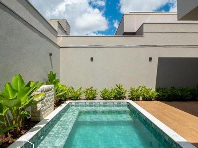 Casa de Luxo em Condomínio na Maria Júlia: 3 Suítes, Piscina, Área Gourmet Aproveite!