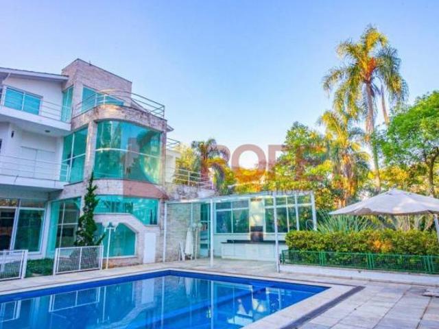 Casa de Luxo no Cidade Jardim 870 m² | 4 Suítes, Porteira Fechada e Piscina Privativa SP