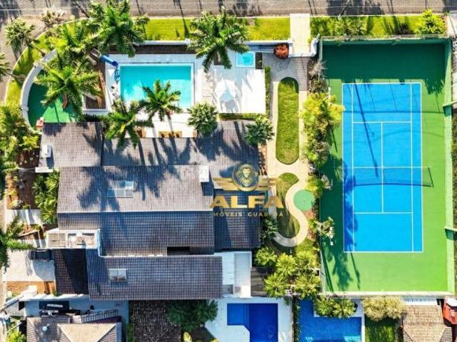Casa de praia com 6 suítes e quadra de tênis no Jardim Acapulco – Alfa Imóveis Guarujá