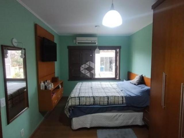 Casa de Três Dormitórios