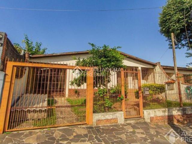 casa de três dormitórios com 2 vagas de garagem
