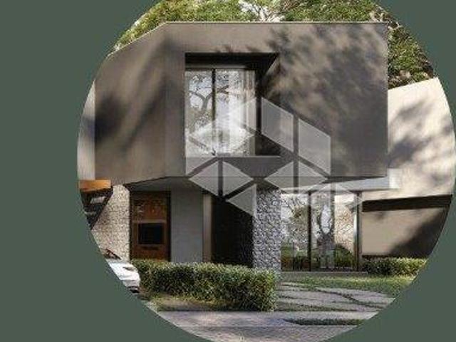 Casa de 04 suites/quartos e 02 vaga de garagem no condominio Amaná Atlântida em Xangri Lá/RS!