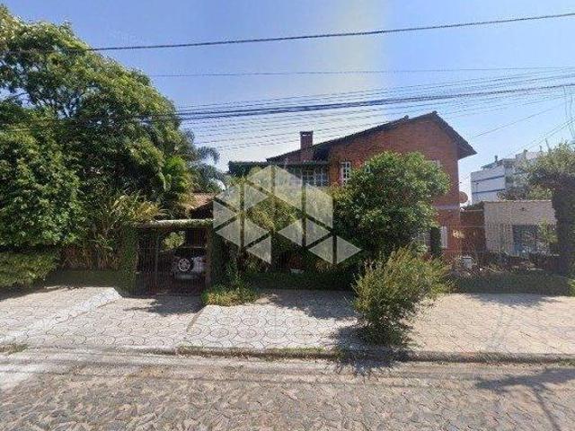 Casa de 02 dormitórios e suíte no Bairro Sumaré em Alvorada