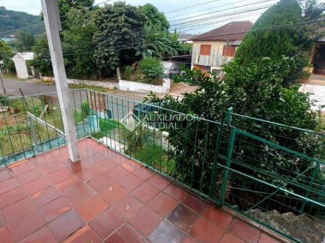 casa de 03 quartos no bairro Vila Nova em Novo Hamburgo