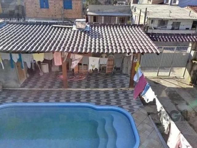 Casa de 191m² com 4 dormitórios, churrasqueira e piscina
