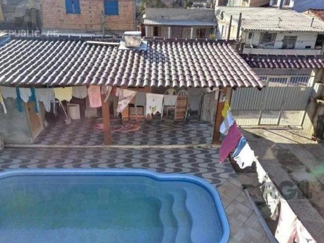 Casa de 191m² com 4 dormitórios, churrasqueira e piscina