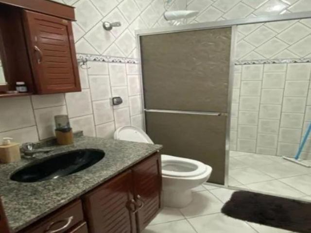 Casa de 220 m² com 3 quartos, 1 suíte, 2 vagas à venda na Vila Tupi
