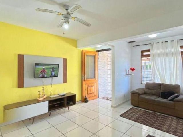 Casa de 2 dormitórios à venda Rua Heitor Kramer, Guarujá Porto Alegre