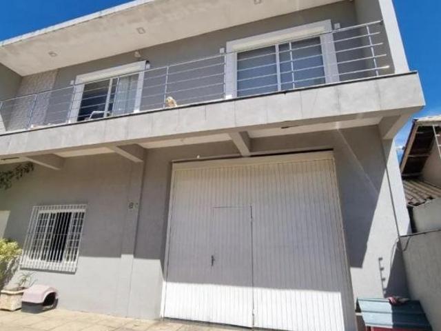 Casa de 2 dormitórios e 6 vagas de garagem em Canoas