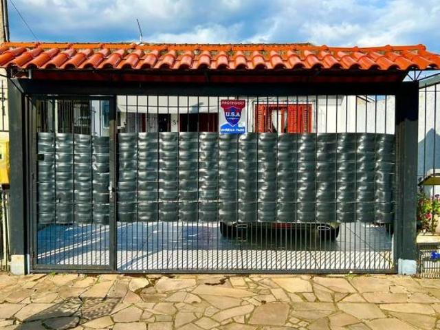 Casa de 2 dormitórios em excelente estado com espaço gourmet! Valor abaixo do mercado!
