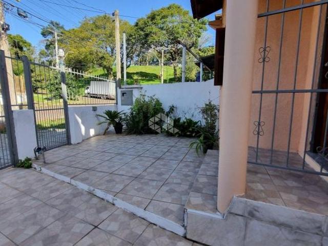 Casa de 2 dormitórios para venda com edícula, 2 vagas de garagem no bairro Santo Antônio em Porto A