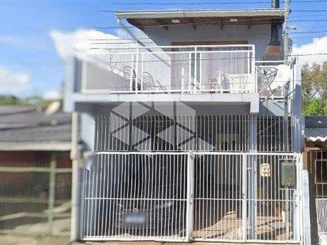 Casa de 2 quartos com garagem na Vila Nova