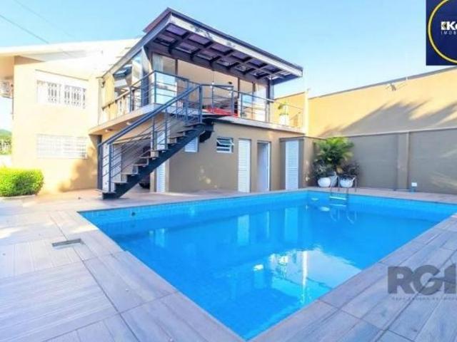 Casa de 380m², bairro Guarujá
