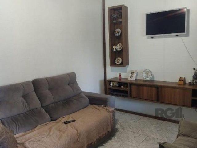 Casa de 3 dormitórios, 1 suíte e 2 vagas de garagem em Viamão