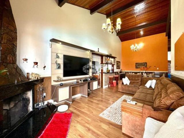 Casa de 3 dormitórios, 1 suíte master, piscina, 3 vagas no Jardim Algarve em Alvorada