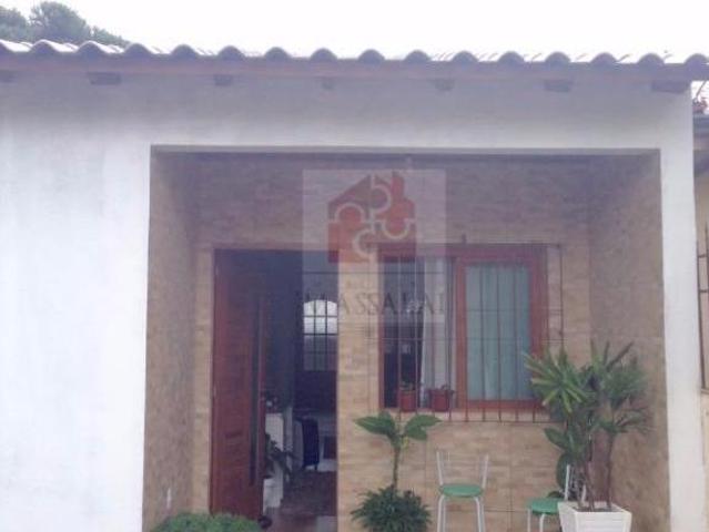 Casa de 3 dormitórios com suíte e garagem à venda no Bairro Vila Nova