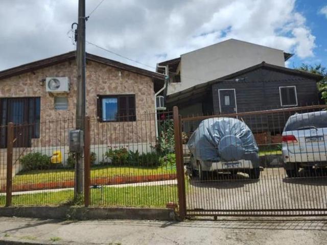Casa de 3 dormitórios e 111m² à venda em Jardim Botânico, Porto Alegre