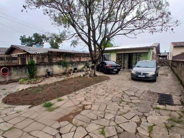 Casa de 3 dormitórios e 2 vagas de garagem em canoas