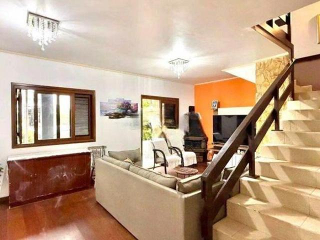 Casa de 3 dormitórios e com 3 vagas de garagem no bairro City em Cachoeirinha