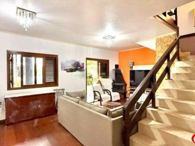 Casa de 3 dormitórios e com 3 vagas de garagem no bairro City em Cachoeirinha