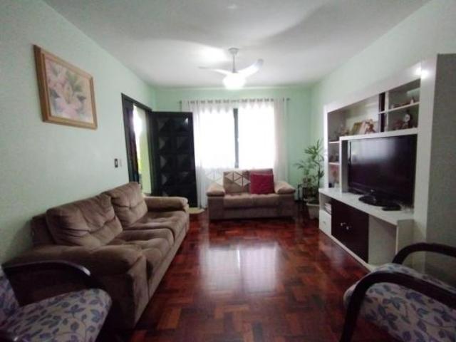 CASA DE 3 DORMITÓRIOS PRÓXIMA AO CENTRO