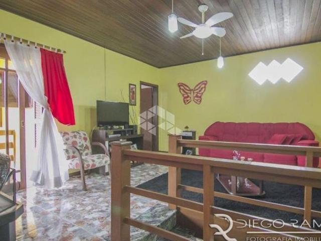 Casa de 3 dormitórios/quartos com suite e closset no Bairro Parque Santa Fé