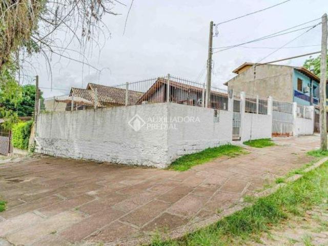 Casa de 3 quartos com 2 vagas à venda no bairro Nonoai em Porto Alegre