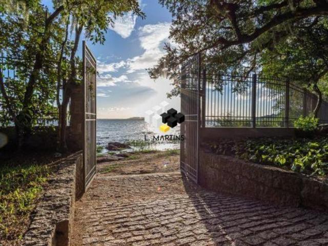 Casa de 441m² de frente para o Guaíba Pedra Redonda Porto Alegre