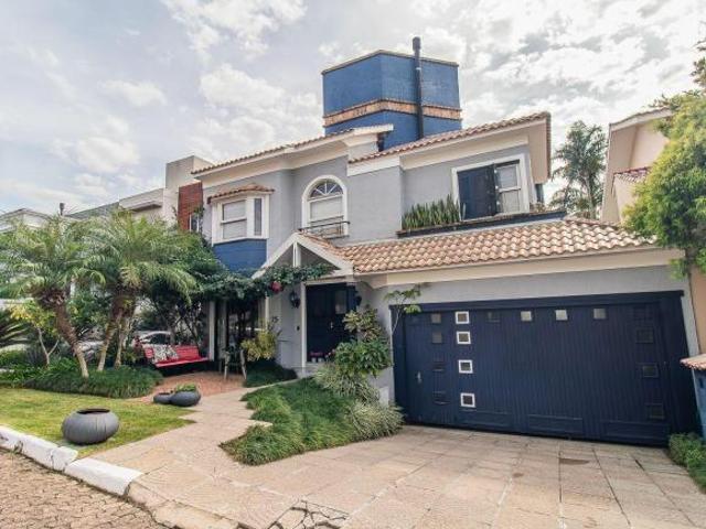 CASA DE 4 DORMITÓRIOS EM CONDOMÍNIO 320 m² 4 VAGAS DE GARAGEM