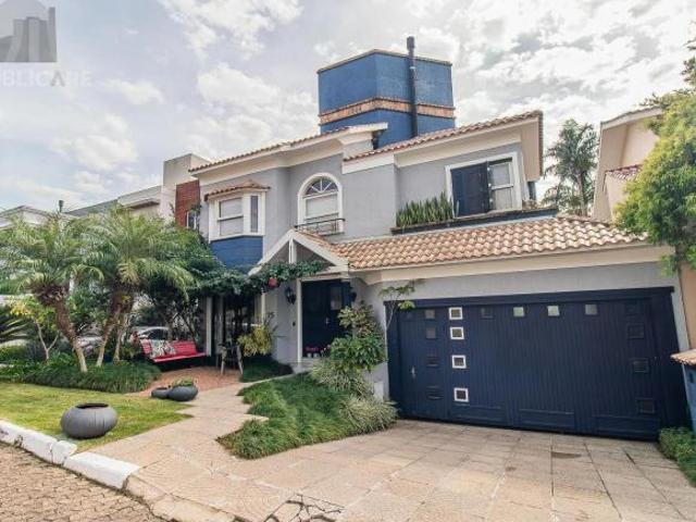 CASA DE 4 DORMITÓRIOS EM CONDOMÍNIO 320 m² 4 VAGAS DE GARAGEM