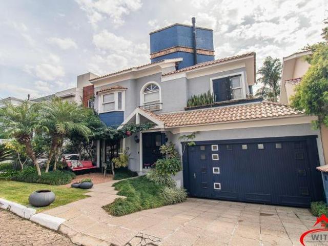 CASA DE 4 DORMITÓRIOS EM CONDOMÍNIO 320 m² 4 VAGAS DE GARAGEM