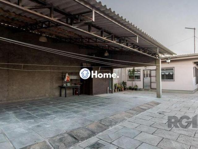 Casa de 4 dormitórios no bairro Santa Rosa de Lima