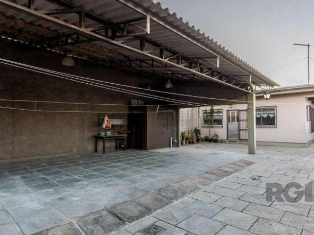Casa de 4 dormitórios no bairro Santa Rosa de Lima