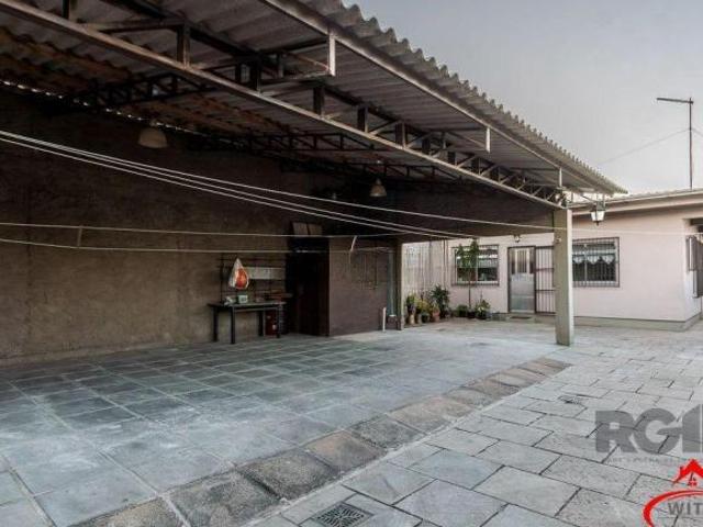 Casa de 4 dormitórios no bairro Santa Rosa de Lima