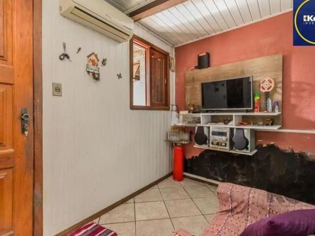 Casa de 4 dormitórios, no bairro Vila Jardim