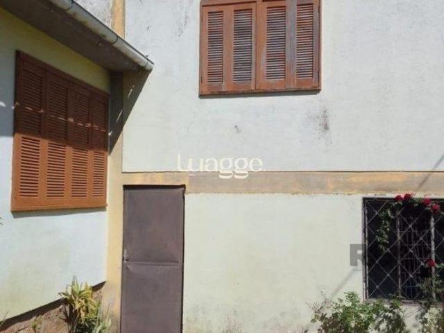 Casa de 4 quartos com 243,58m² no Bairro Lomba do Pinheiro