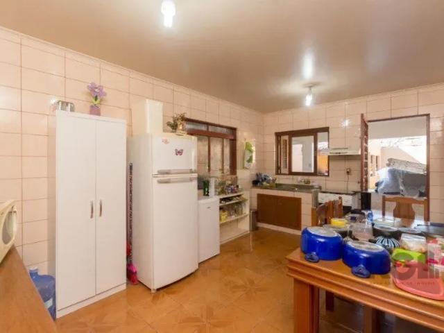 Casa de 4 quartos com 265m², no bairro Cavalhada