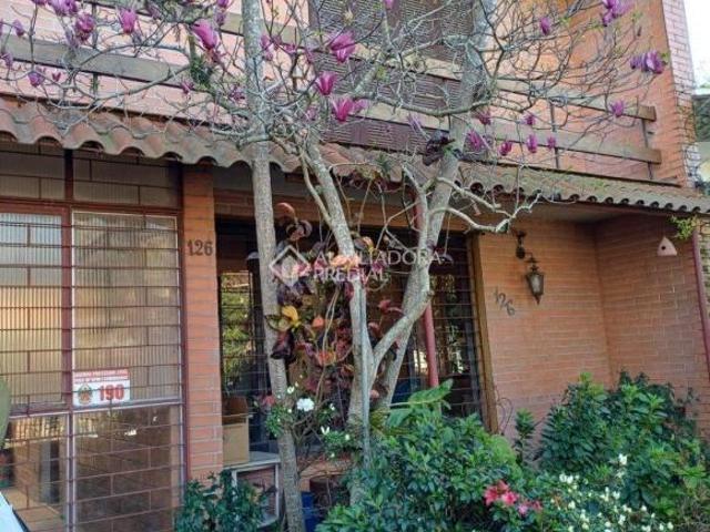 Casa de 4 quartos com 2 vagas à venda no bairro Jardim Botânico em Porto Alegre