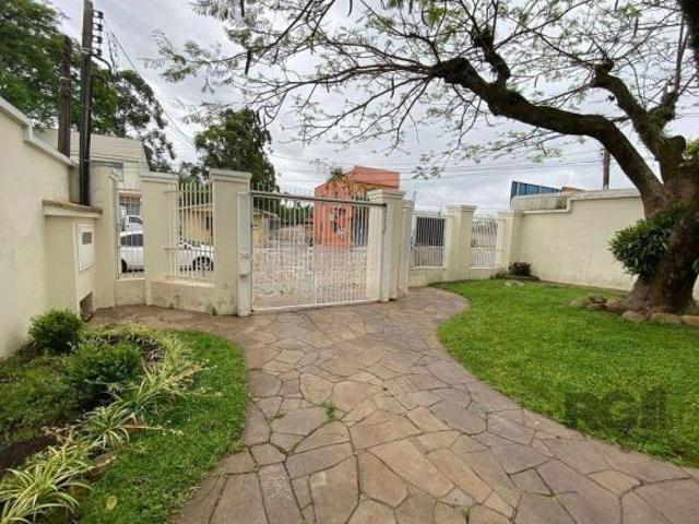 Casa de 5 dormitórios, bairro Jardim Floresta