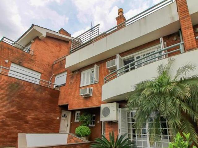 Casa de 5 dormitórios em condomínio vigilância 24h no bairro Santa Tereza próximo a Rua Correa Lima