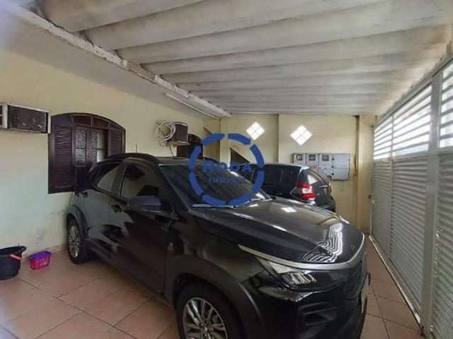 Casa de 5 dormitórios sendo 1 suíte tipo sobrado, em Santos na Santa Maria