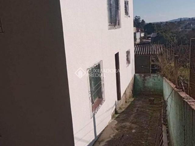 Casa de 5 quartos à venda no bairro Lomba do Pinheiro em Porto Alegre
