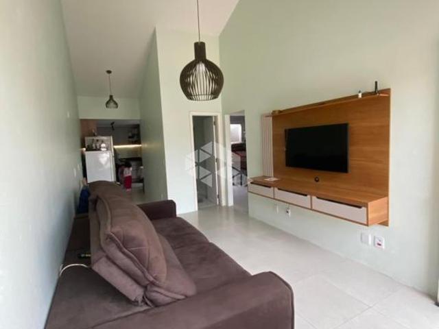 Casa dois dormitórios em condomínio Rio Branco Canoas