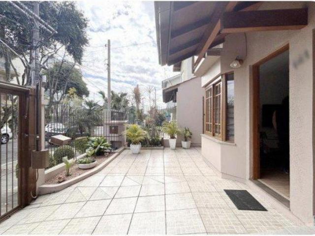 Casa excelente padrão com jardim e churrasqueira em Novo Hamburgo