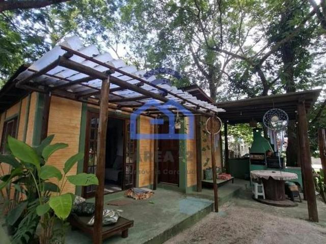 Casa Exclusiva em Meio à Natureza à venda no bairro do Massaguaçu em Caraguatatuba, SP