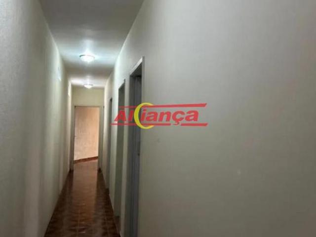 Casa em avenida comercial