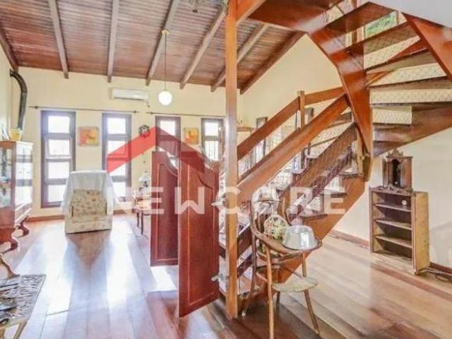 Casa em Avenida Guarujá Guarujá Porto Alegre/RS